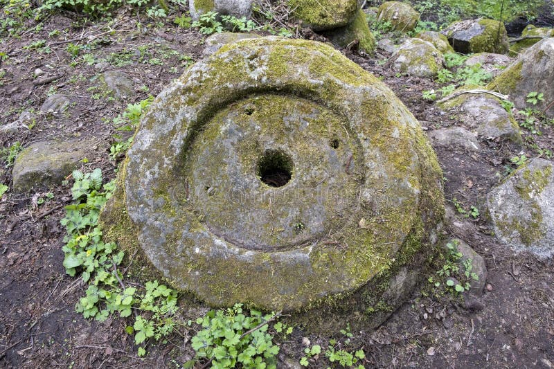 Ancient Millstone on Ground Stock Photo - Image of millstone, ruins ...