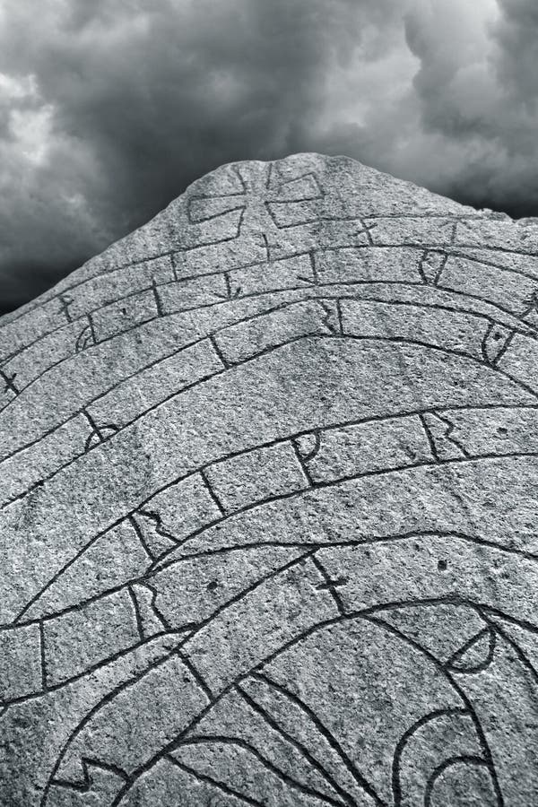 Ancient Runestone with Wind Power on the Background in a Landscape at ...