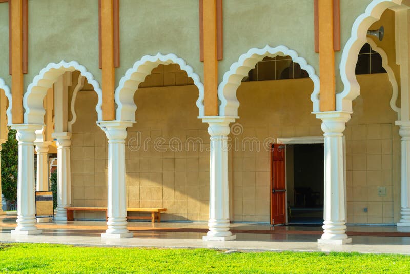Ancient Pillars on Front of Building with Grass Stock Image - Image of ...