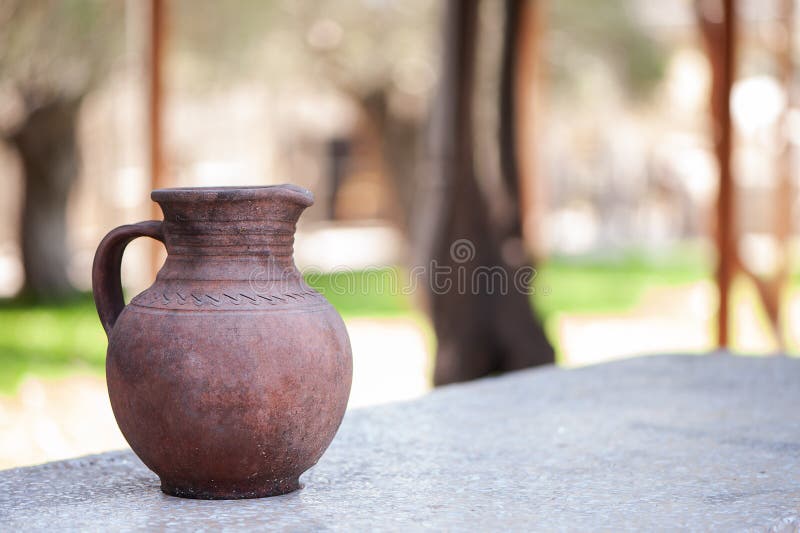 Ancient Pitcher on a Natural Background Stock Photo - Image of ...