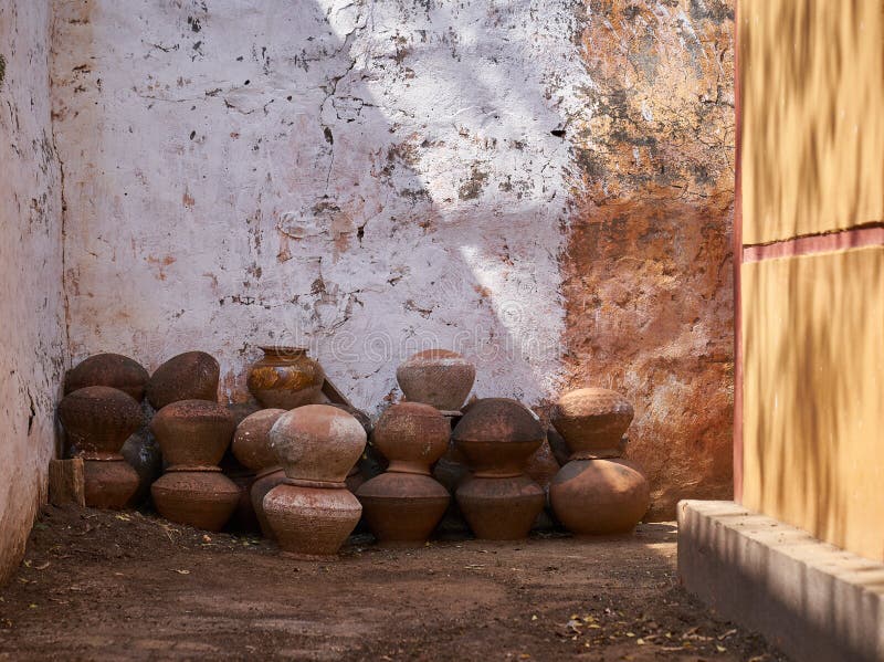 Ancient Pots Stacked Against a Wall Stock Image - Image of ancient ...