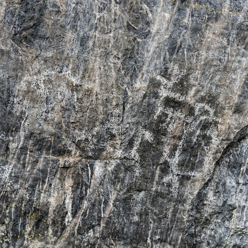 Ancient Primitive Rock Carvings on Black Stone Stock Photo - Image of ...