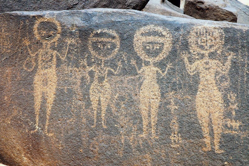 Ancient Rock Art in Niger Depicting Four Figures Stock Photo - Image of ...