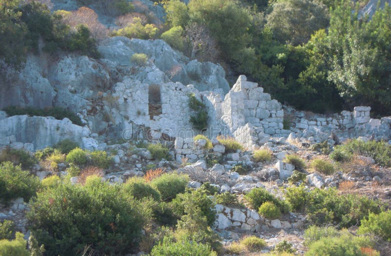 Ancient rocks with caves stock photo. Image of river - 243446288