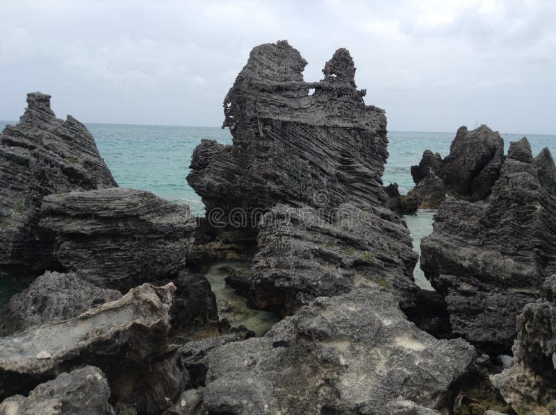 Ancient Rocks of the Sea stock image. Image of coral - 249264889