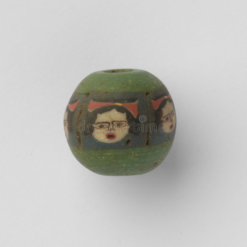 Ancient Roman Bead with Faces Stock Photo - Image of jewelry, technique ...