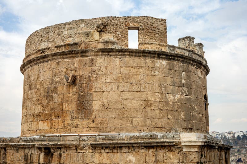 Ancient Roman Stone Tower with Cloudy Sky in Antalya Stock Photo ...
