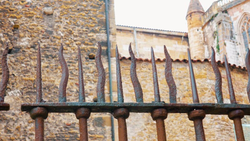 Ancient Rusty Iron Fence with Curved Sharp Peaks Stock Video - Video of ...