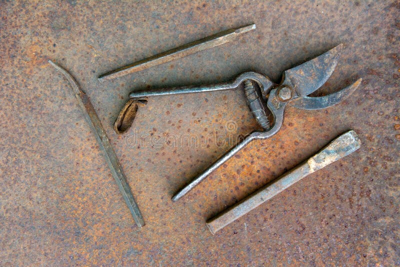 Ancient Rusty Tools on a Metal Surface. Steampunk Style Stock Photo ...