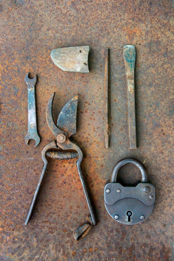 Ancient Rusty Tools on a Metal Surface. Steampunk Style Stock Photo ...