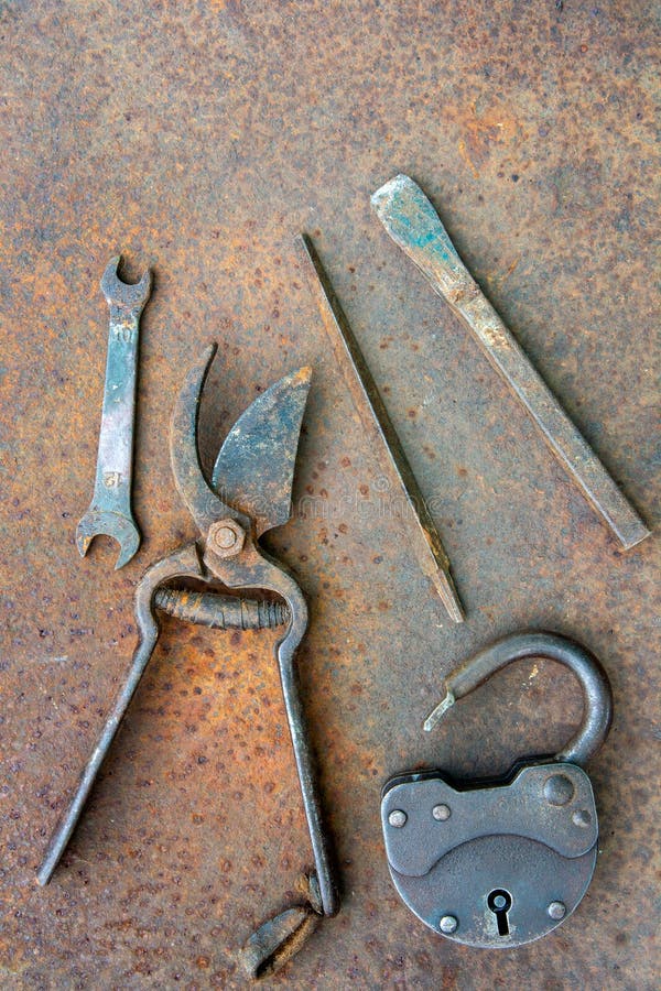 Ancient Rusty Tools on a Metal Surface. Steampunk Style Stock Image ...