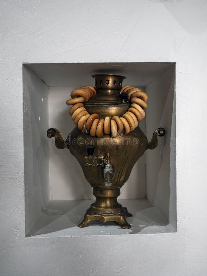 Ancient Samovar and Steering Wheels in a Niche Inside the Hut Stock ...