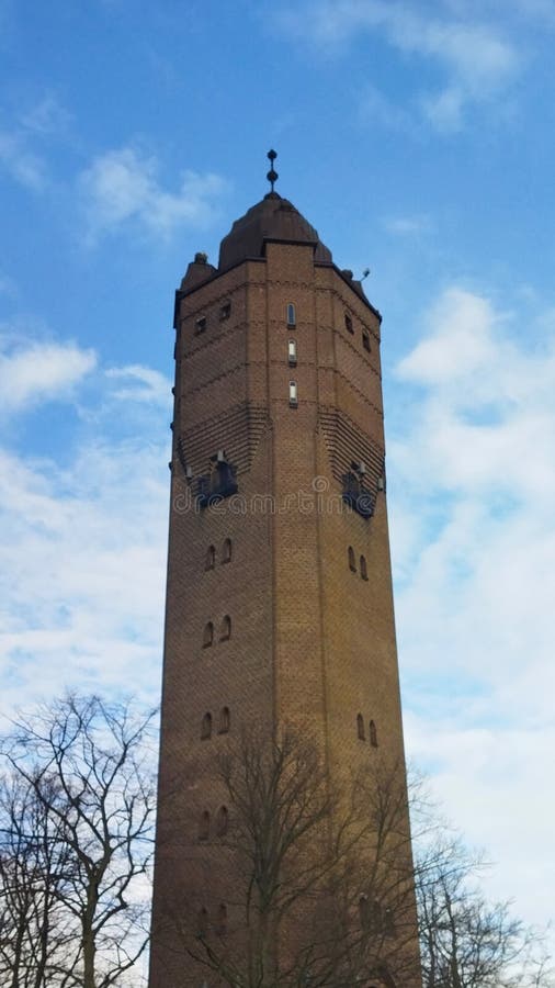 An Ancient Scandinavian Brick Tower. the Old Building Stands Against ...