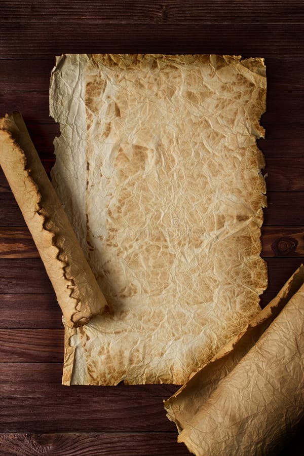 Old Scroll on a Wooden Table, Crumpled Paper Texture As Background ...