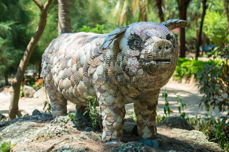 Ancient Shell Pig Statue in the Park Stock Image - Image of beautiful ...