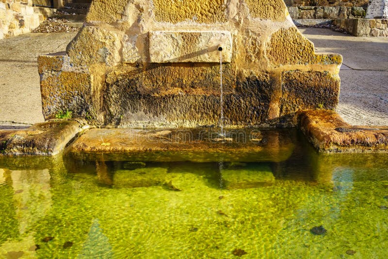 Ancient Source of Fresh and Transparent Water Made of Stone in an Old ...