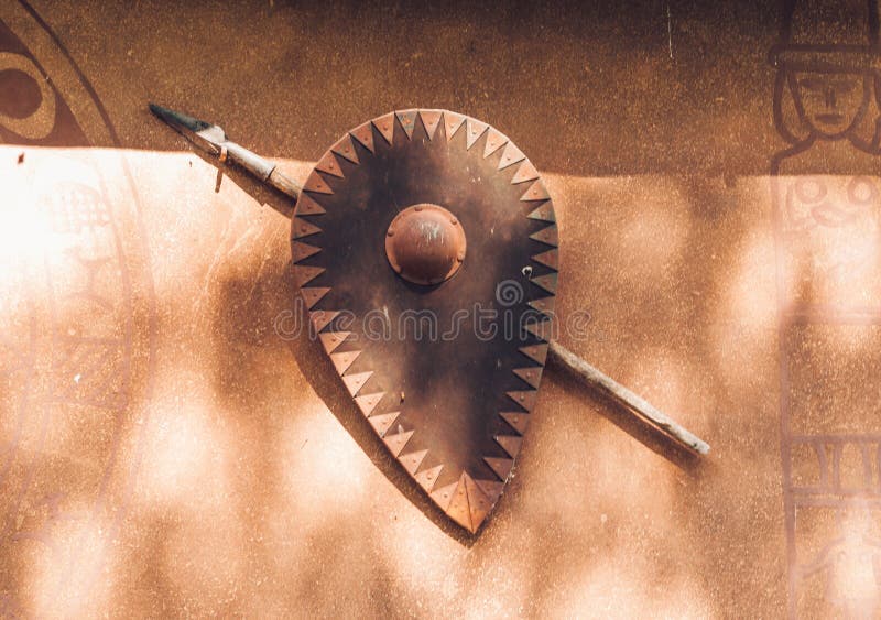 Ancient Spear and Shield Illuminated with Sunshine Stock Photo - Image ...