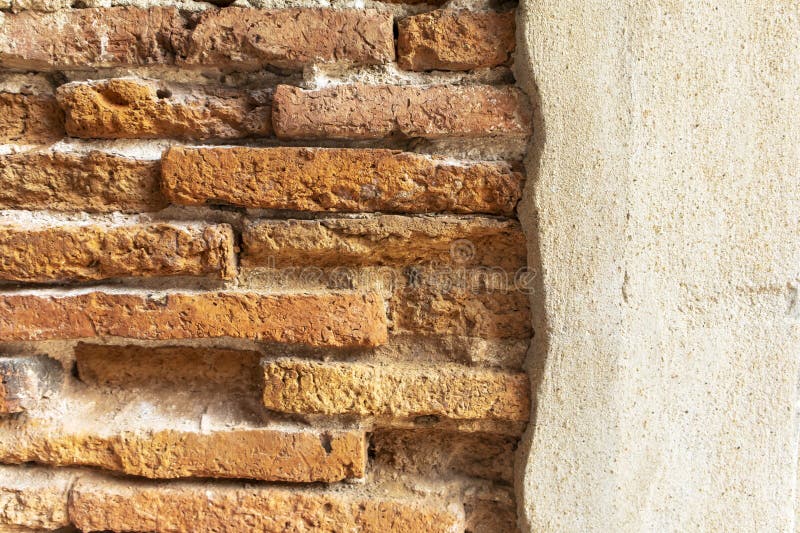 An Ancient Square Stone Wall with Light Brown Plaster Stock Image ...
