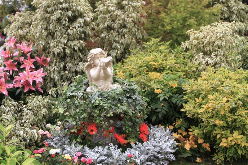 An Ancient Statue of Guardian Angel in Spring Stock Image - Image of ...