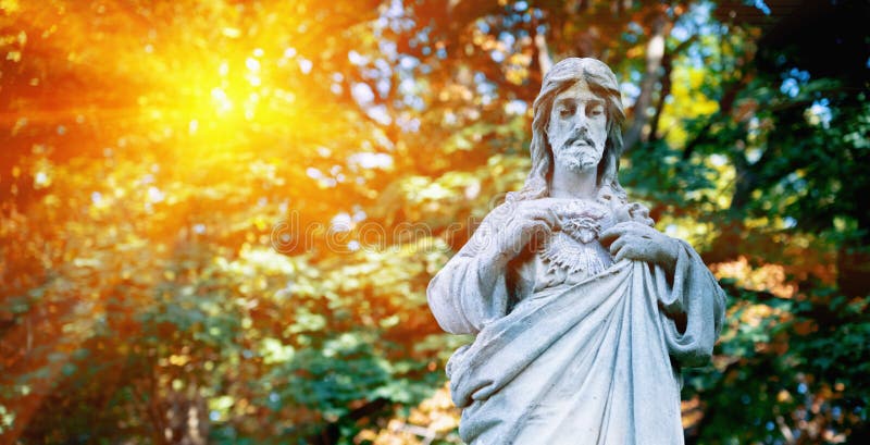 Ancient Statue of Jesus Christ in the Rays of Light Stock Photo - Image ...