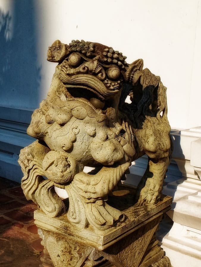 An Ancient Statue of a Mythical Creature Made in the East Asian Style ...