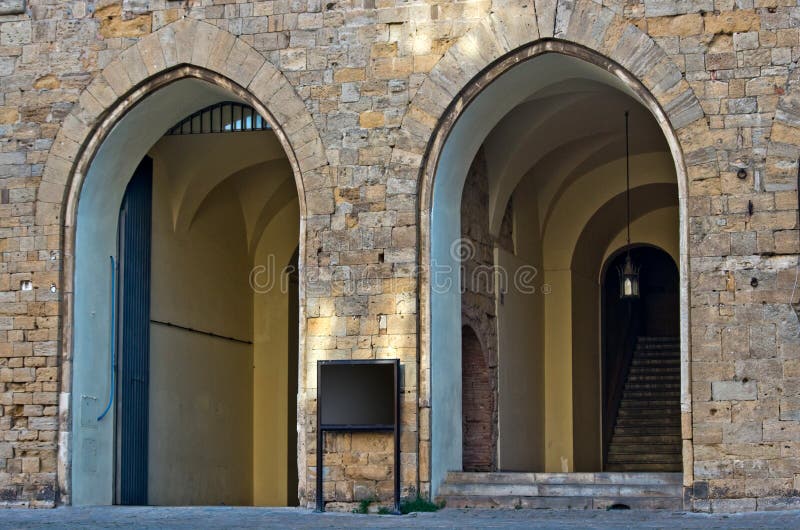 Ancient Stone Arch in the Medieval Walls of the Historic City Stock ...