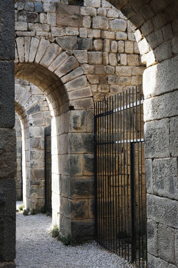 Ancient Stone Archway with Iron Gates Stock Photo - Image of historical ...