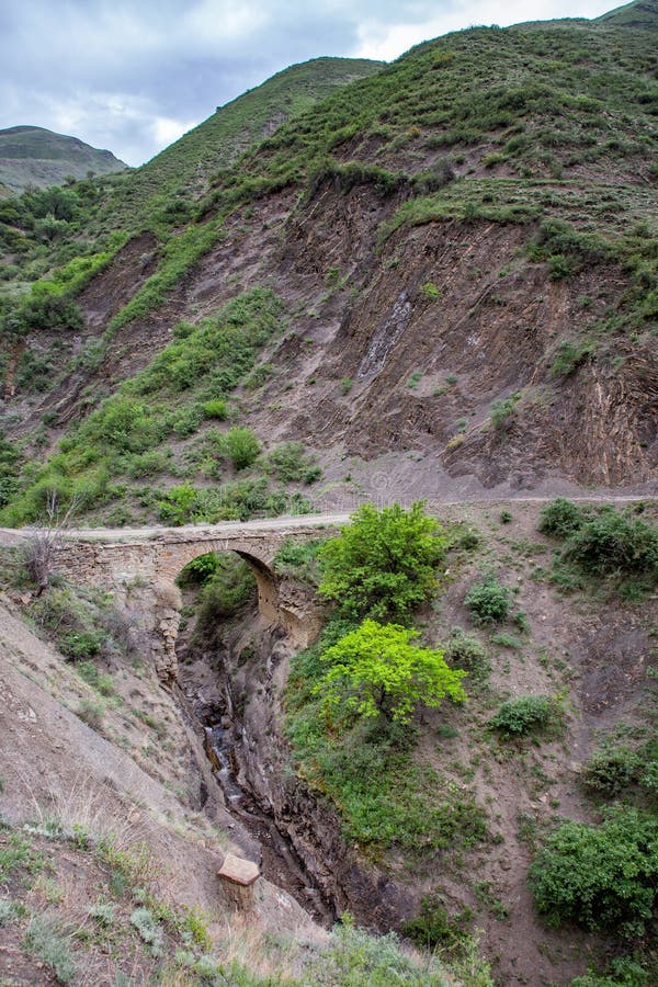 Ancient, Stone Bridge Across the River in the Gorge of the Southern ...