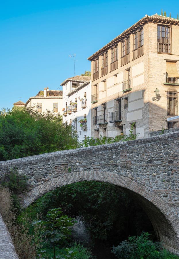Ancient Stone Bridge Over the Darro River in Granada, Spain Stock Photo ...