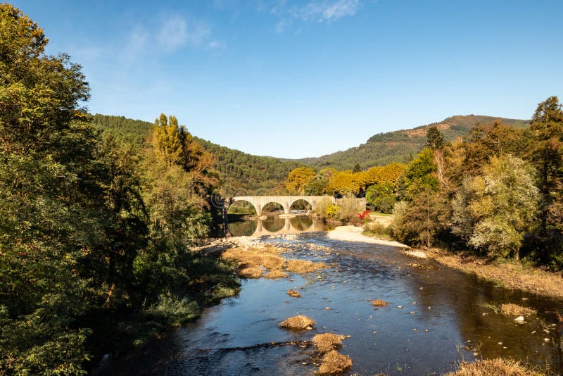 Ancient Stone Bridge Over the River Stock Image - Image of green ...