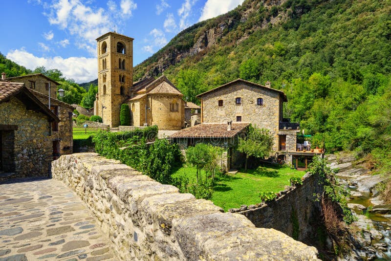 Ancient Stone Bridge that Passes Over the River in the Mountain Village ...