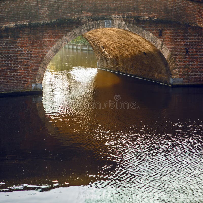 Ancient Stone Bridge through River in Hague Stock Photo - Image of ...