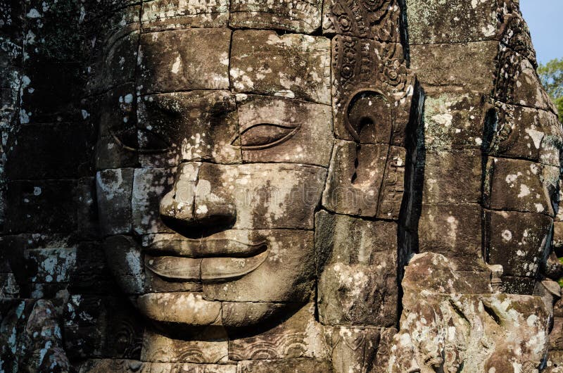 Ancient Stone Faces of Asian Culture, in Abandoned Temples Stock Image ...