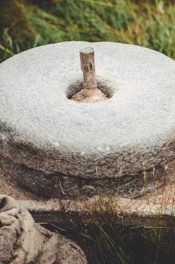 Millstone for Grinding Wheat and Seeds To Make Flour Stock Photo ...