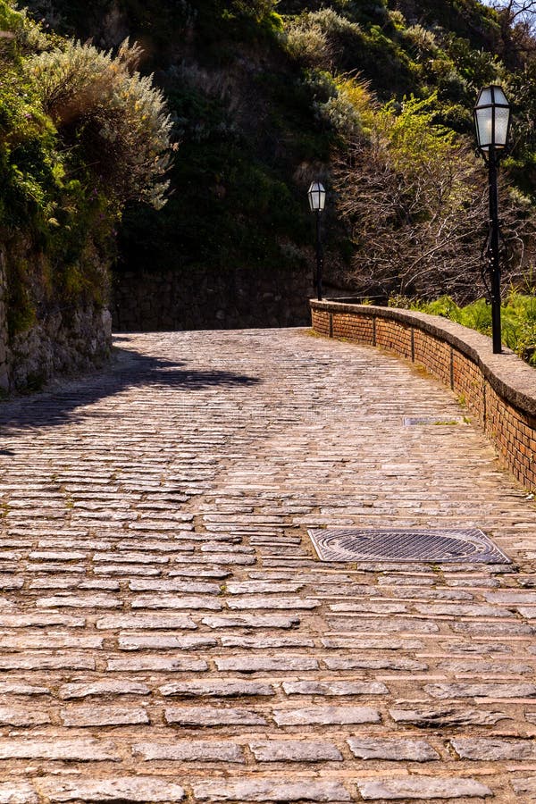 Ancient stone road stock image. Image of road, plant - 144041743