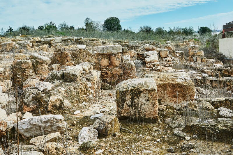 An Ancient Stone Ruin with Scattered Remnants of Old Walls and ...