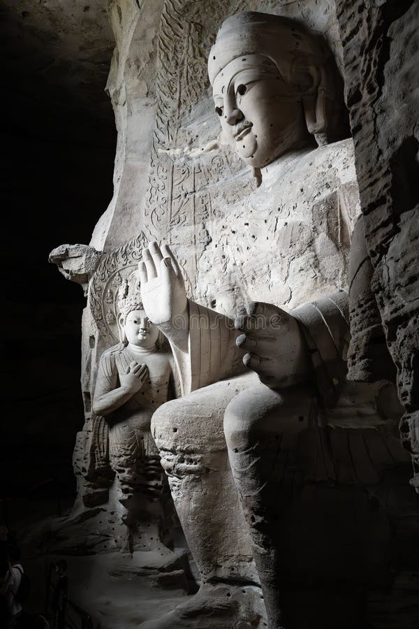 Ancient Stone Statues of Buddha Inside the Yungang Grottoes in Datong ...