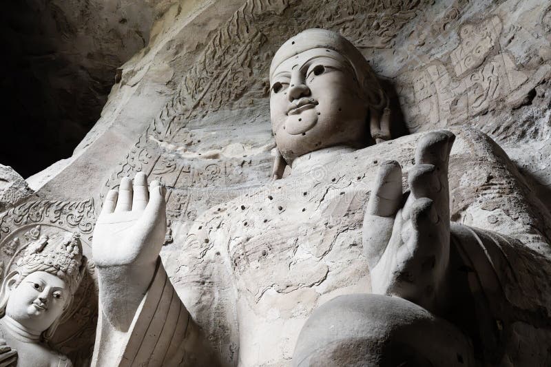 Ancient Stone Statues of Buddha Inside the Yungang Grottoes in Datong ...