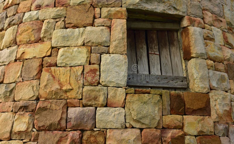 An Ancient Stone Structure with a Wooden Hatch Stock Image - Image of ...