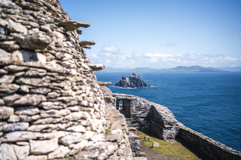 Ancient Stone Walls Overlook Irish Sea Stacks. Skellig Michael Stock ...
