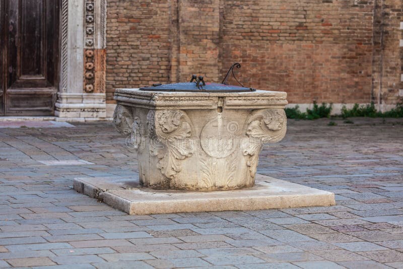 Ancient Stone Well for Rain Water in a Square in Venice Stock Image ...