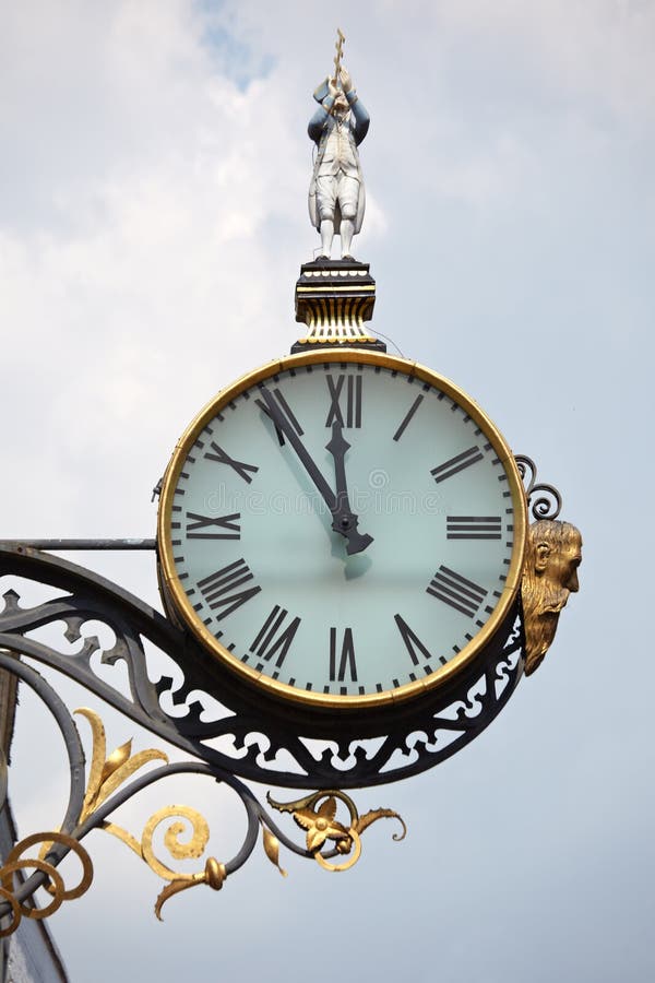 Ancient street clocks stock image. Image of gold, street - 19072295