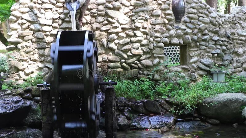 Watermill, a Water Wheel To Lift Water for Irrigation. Stock Footage ...