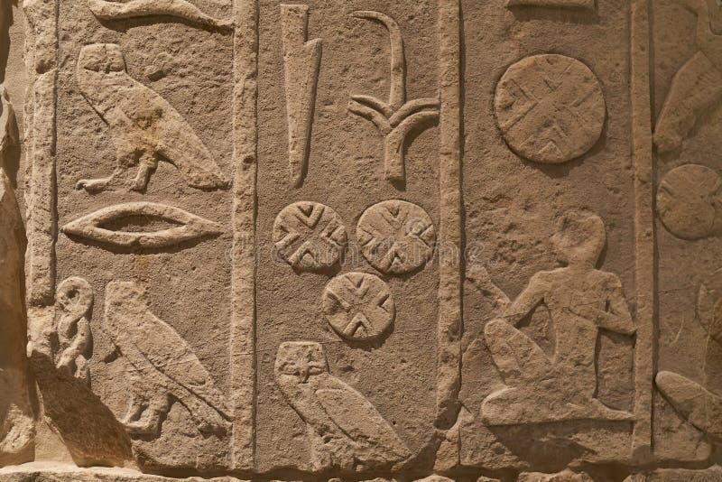 Ancient Text in the Form of Egyptian Hieroglyphics on a Wall Stock ...