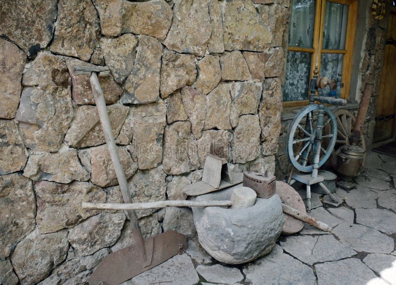 Ancient Tools and Everyday Objects Next To the Wall Stock Image - Image ...