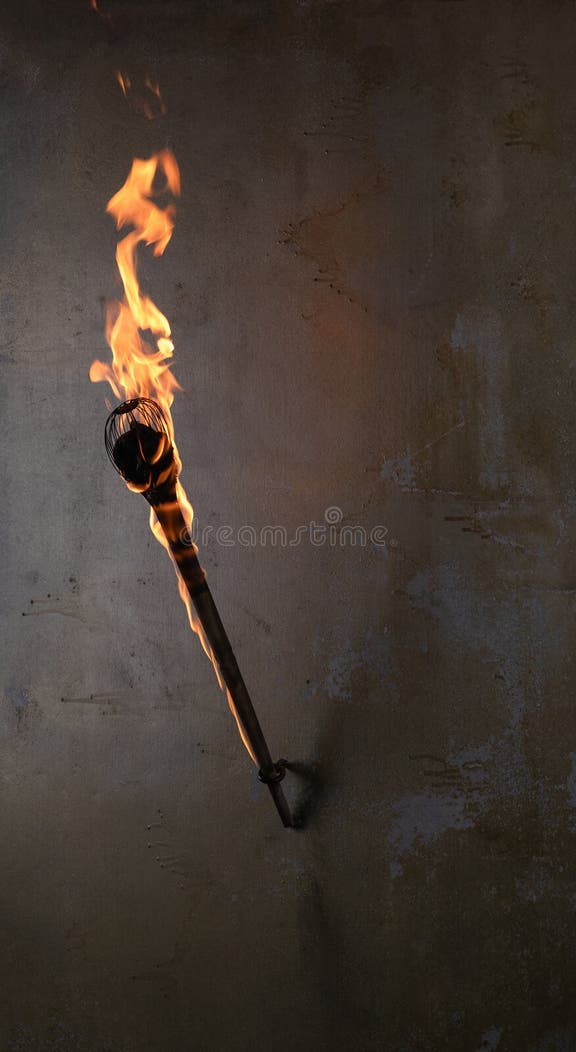 Ancient torch on old wall stock image. Image of iron - 335635707
