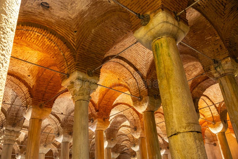 Ancient Underground Cistern with Row of Illuminated Stone Columns and ...
