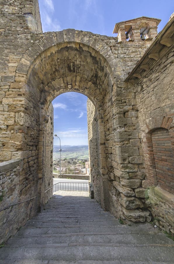 Ancient Village with Passage Under Archway in Tuscany Stock Photo ...