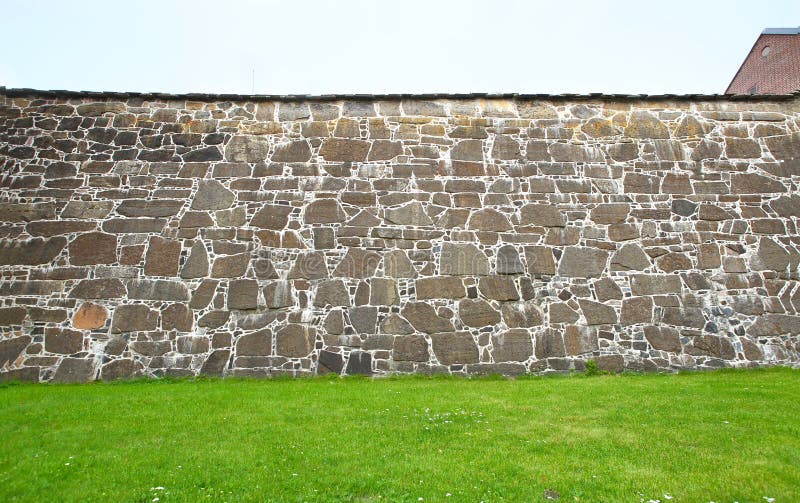 Ancient Wall and Grass Field in Front with Copy Space. Stock Photo ...
