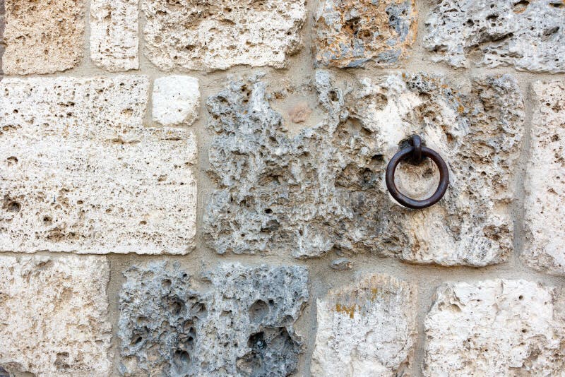 Ancient Wall with Rusted Iron Hitching Ring Stock Photo - Image of ...